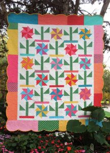 This Colorful Flower Garden Will Brighten Any Room - Quilting Digest