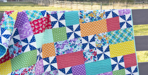 Pinwheels Dance Across This Versatile Quilt - Quilting Digest